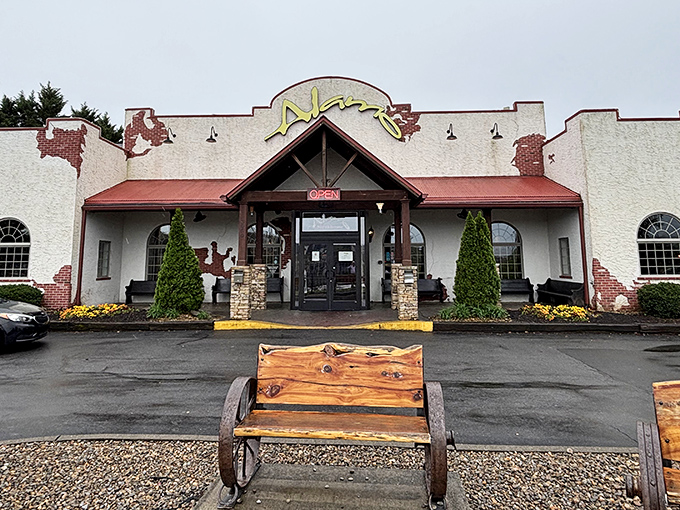 Those rustic wooden benches aren't just for show&mdash;they're where you'll contemplate life's big questions, like "How did I eat that entire porterhouse?"