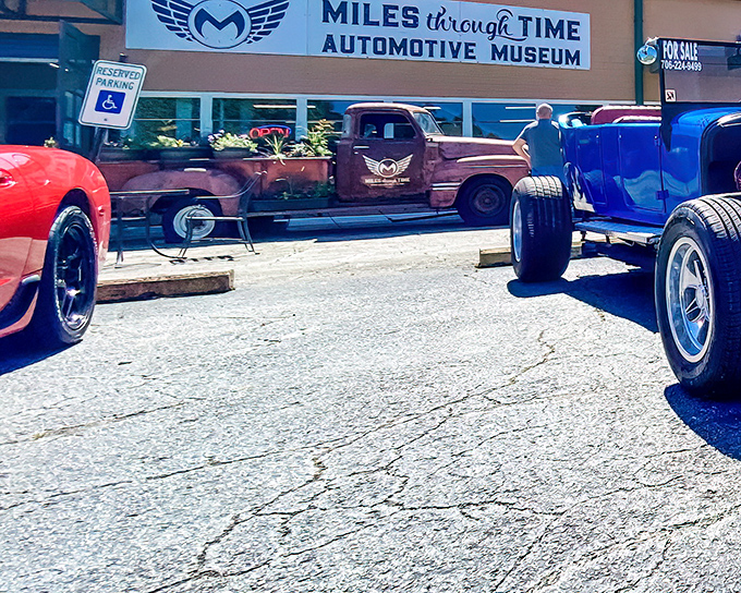 The entrance to Miles Through Time Automotive Museum beckons car enthusiasts with vintage beauties flanking the doorway&mdash;automotive appetizers before the main course inside.
