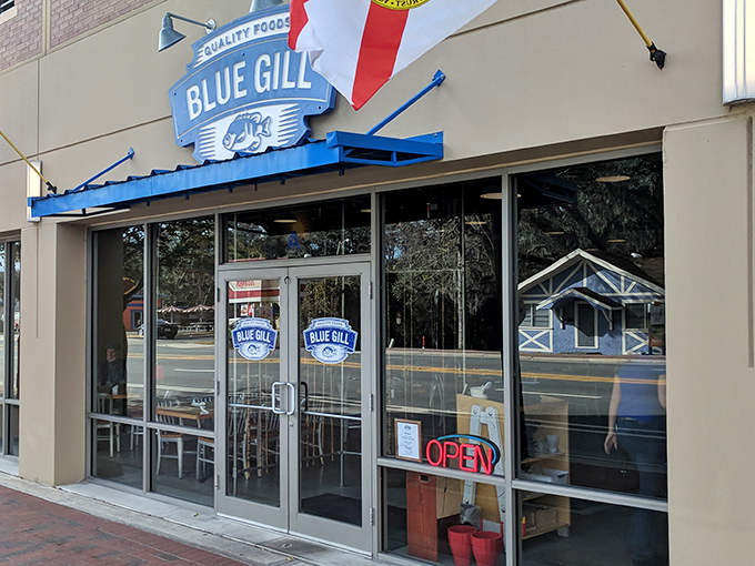 The unassuming storefront of Blue Gill Quality Foods, where culinary magic happens behind a modest fa&ccedil;ade. Like finding a Picasso at a yard sale.