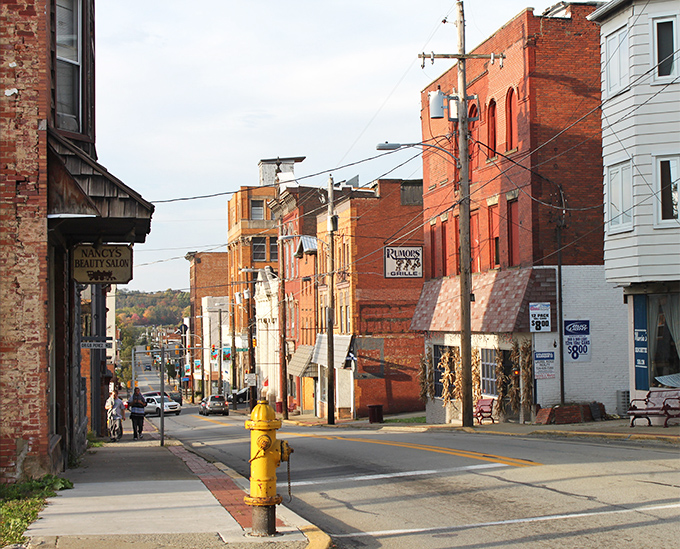 Historic brick buildings line Crawford Avenue, showcasing Connellsville's architectural heritage that whispers stories of its coal and coke boom days.