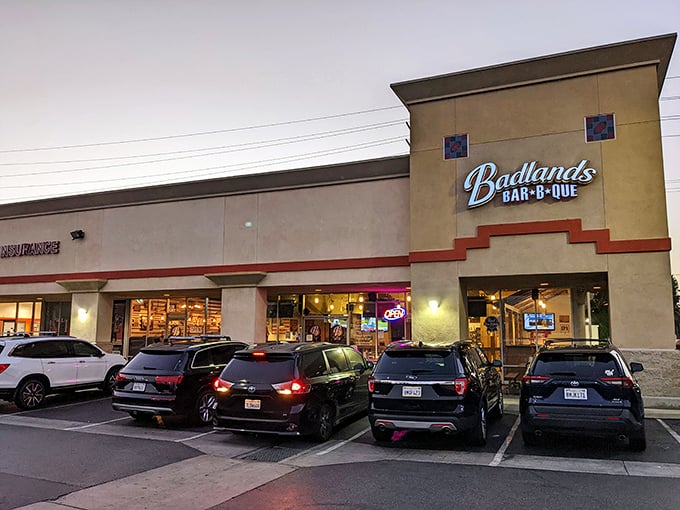 The unassuming strip mall exterior of Badlands BBQ proves once again that the best BBQ joints often hide in plain sight.