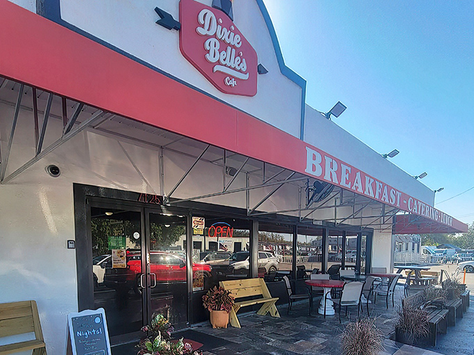 Morning sunshine highlights Dixie Belle's inviting entrance, where the promise of "BREAKFAST-CATFISH-LUNCH" tells you everything you need to know about your day's priorities.