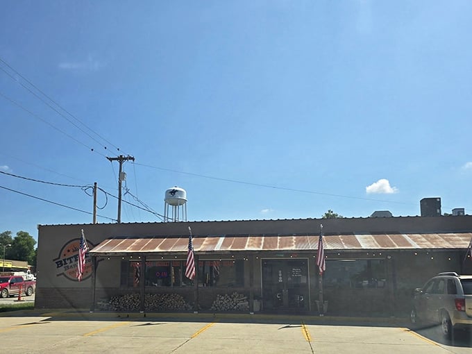 The humble exterior of Bite Me Barbecue doesn't shout for attention&mdash;it lets the smoke signals and American flags do the talking.