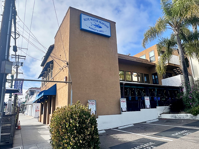 From this angle, you can almost hear the seagulls. The unassuming exterior hides culinary treasures that would make Neptune himself put down his trident for a bite.
