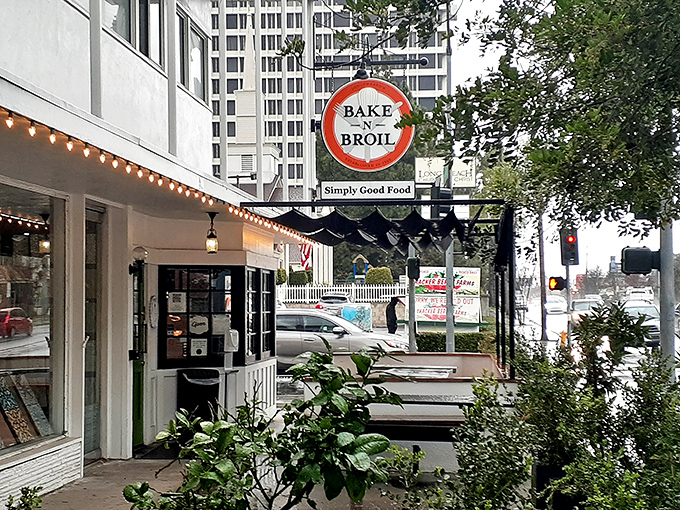 The iconic Bake n Broil sign promises "Simply Good Food" &ndash; a refreshing understatement that belongs in the Modesty Hall of Fame.