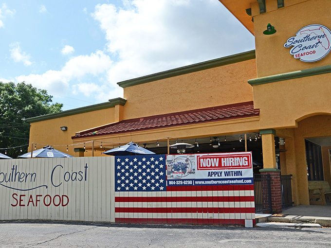 The patriotic fence says it all &ndash; this unassuming yellow stucco building houses seafood treasures that would make Neptune himself jealous.