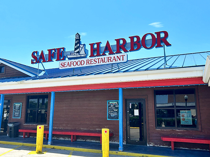 The iconic red and blue sign welcomes hungry seafood lovers like a lighthouse guiding ships to shore. No pretension, just the promise of fresh catches ahead.