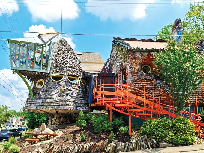 The Mushroom House stands proudly against a blue Ohio sky, its wooden shingles and porthole windows creating a fairytale vision in suburban Cincinnati.