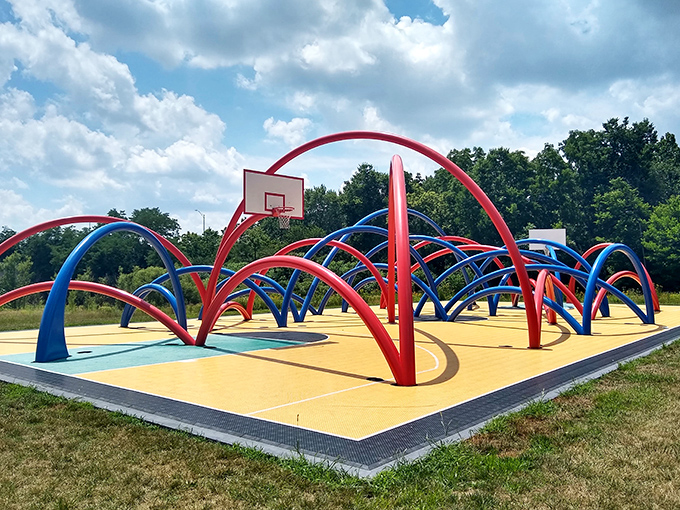 Basketball meets modern art in "Free Basket," where vibrant reds and blues twist into hoops that would challenge even Indiana's finest players.