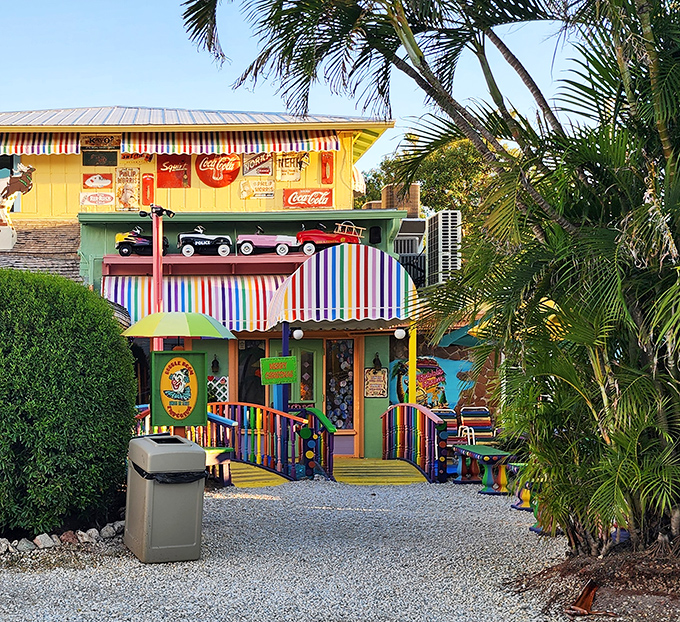 This rainbow-striped wonderland looks like Willy Wonka decided to open a beach restaurant with excellent taste in vintage signage.