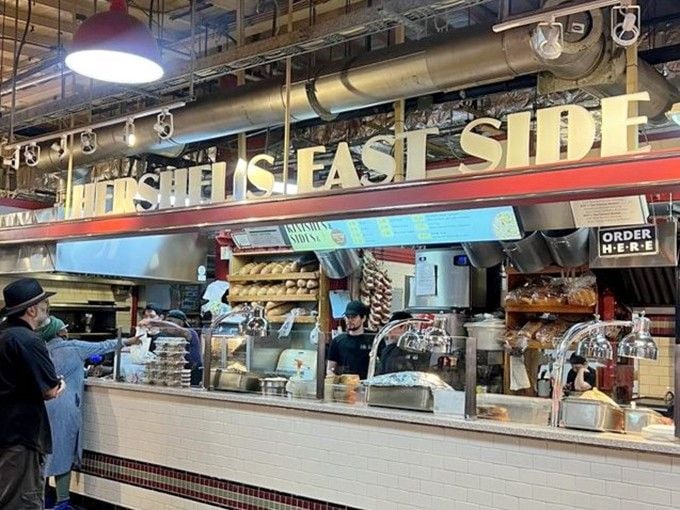 The gleaming counter at Hershel's East Side Deli beckons like a beacon of authentic Jewish comfort food.