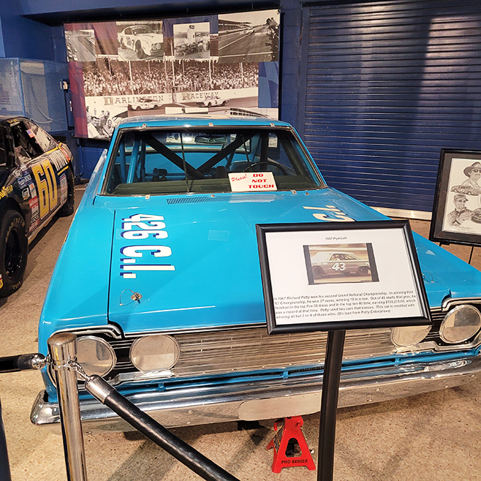 Up close with racing royalty. The legendary Petty blue Plymouth showcases the raw, stripped-down engineering that made NASCAR legends in the '60s.