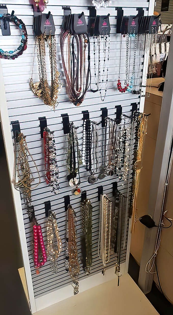 Jewelry and accessories displayed with gallery-like precision. These necklaces are ready for their second act&mdash;no drama, just glamour.