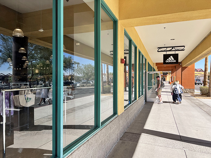 Adidas brings its three-stripe magic to the covered walkway, offering blessed shade and sneaker deals in equal measure.