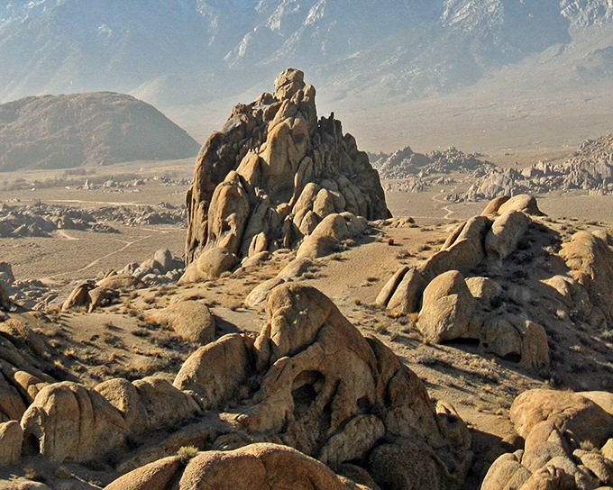 From above, the rocks resemble a giant's playground where massive stone toys were abandoned mid-game thousands of years ago.