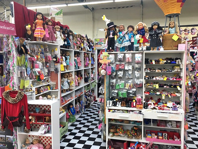 American Girl dolls stand at attention in their perfectly organized kingdom, where childhood dreams and adult collecting obsessions meet on checkered floors.