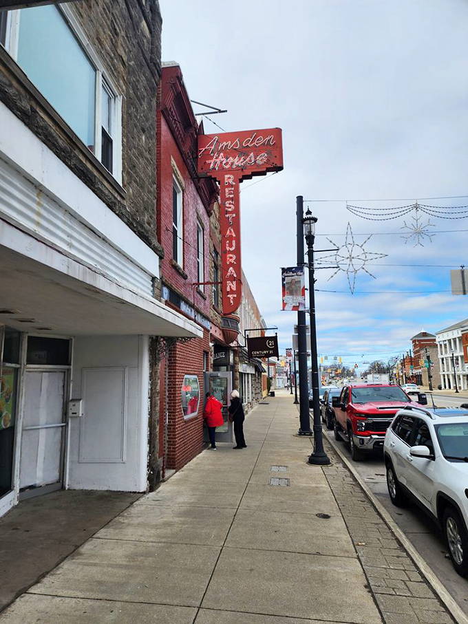 The Amsden House Restaurant's vintage neon sign doesn't just advertise food&mdash;it broadcasts a beacon of comfort to hungry souls wandering Main Street.