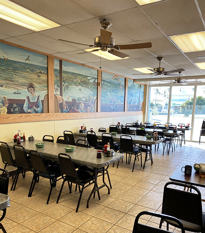 Long tables accommodate large groups, while the murals continue their visual storytelling of Keys life and history.