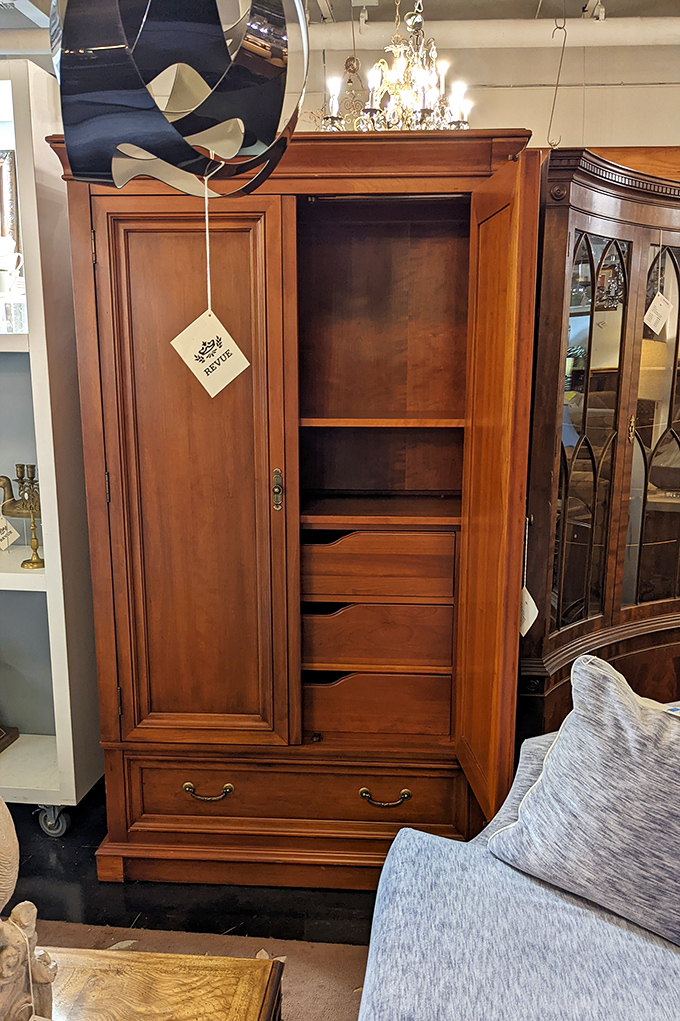 This handsome wardrobe stands ready to swallow your clothing collection while making your bedroom look like it belongs in a design magazine.