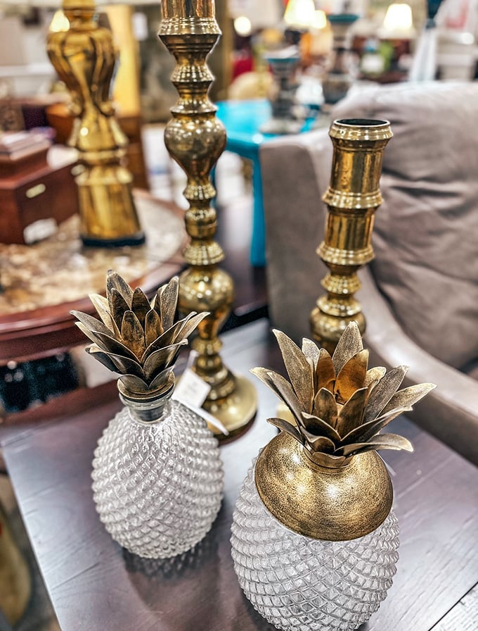 Metallic pineapples and candlesticks that scream "I have excellent taste" without whispering "I paid too much." Instant sophistication for any surface.