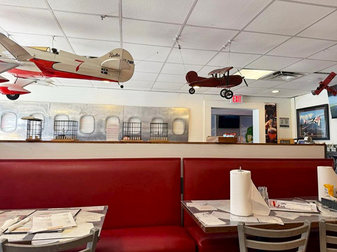 The aviation theme continues with model planes suspended from the ceiling&mdash;your taste buds will be flying too.