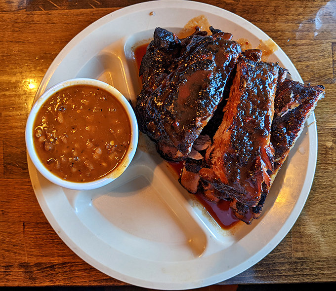 Ribs that don't just fall off the bone&mdash;they practically leap onto your fork, with beans that have clearly been simmering since sunrise.