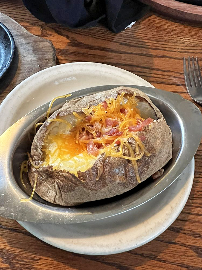 This loaded baked potato isn't just a side dish&mdash;it's a main event wrapped in foil, waiting to steal the spotlight from whatever it accompanies.
