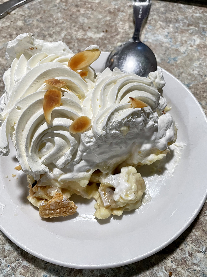 This isn't just whipped cream&mdash;it's a cloud that decided to vacation on a slice of heaven. Banana cream pie that would make your grandmother both proud and jealous.