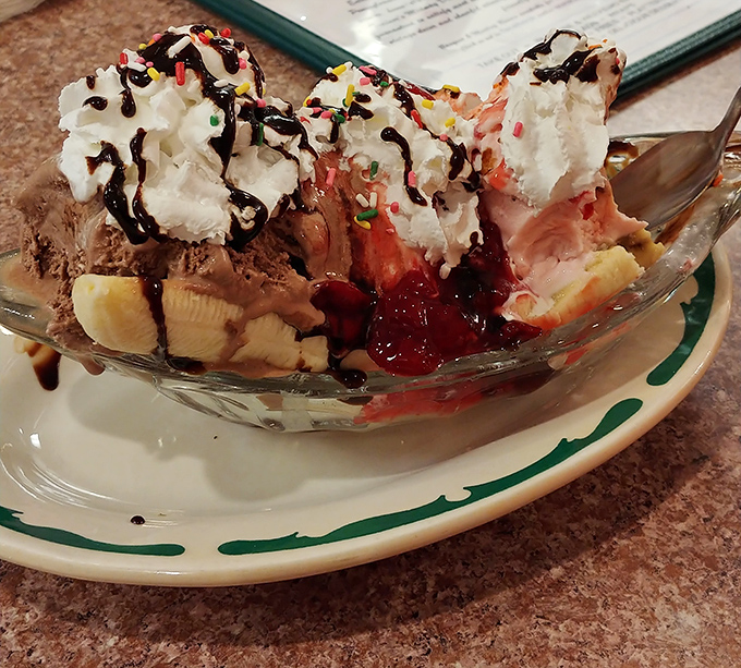 A banana split engineered for pure joy, complete with enough toppings to spark childhood memories instantly.