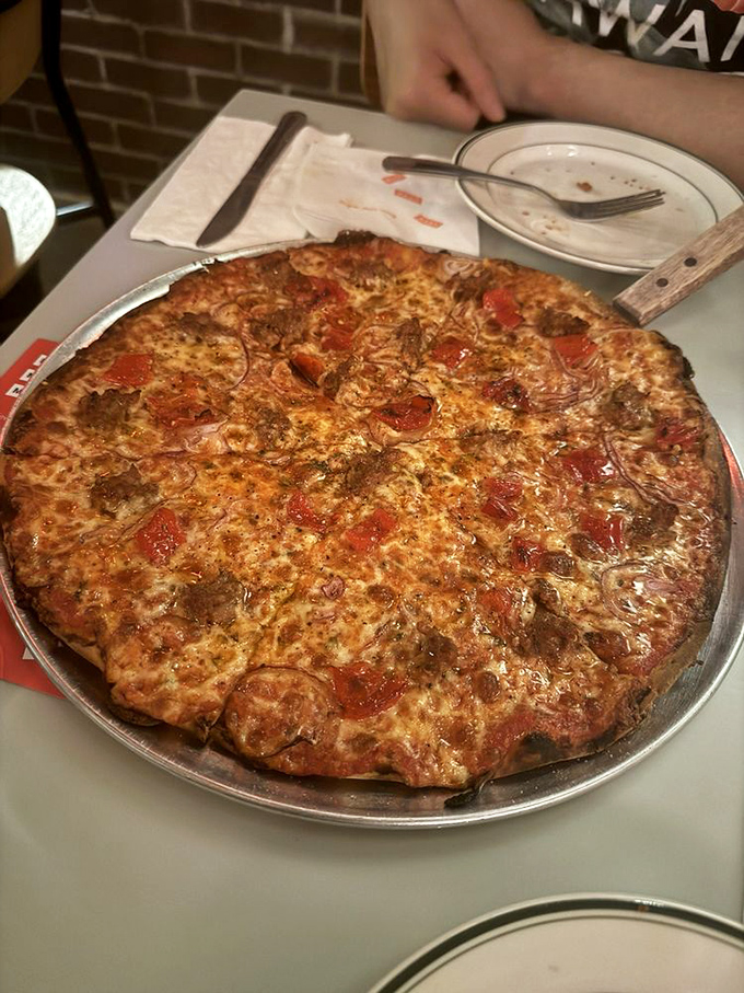 This isn't just pizza&mdash;it's architecture with cheese, where every crispy corner piece is worth fighting your best friend for.