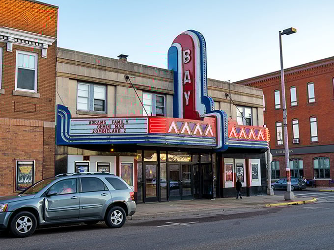The Bay Theater's classic neon marquee promises entertainment the old-fashioned way&mdash;without subscription fees or buffering issues.