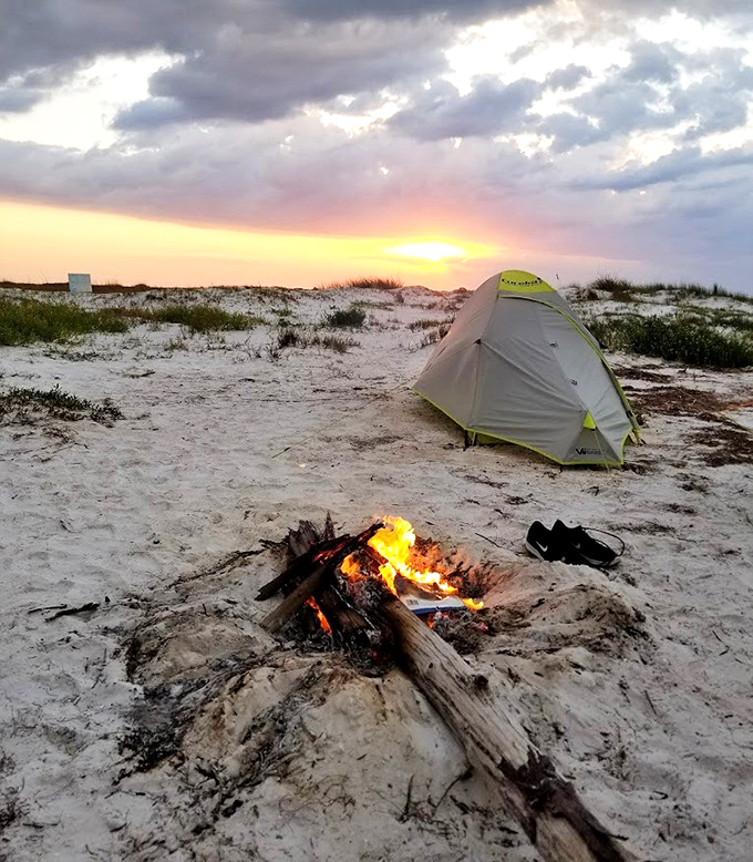 Camping doesn't get more magical than this: a tent, a campfire, and a sunset that makes hotel rooms seem like a terrible compromise.