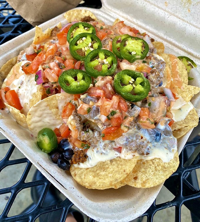 Nachos that don't skimp on the good stuff &ndash; each chip a delivery vehicle for maximum flavor and those jalape&ntilde;os mean business.