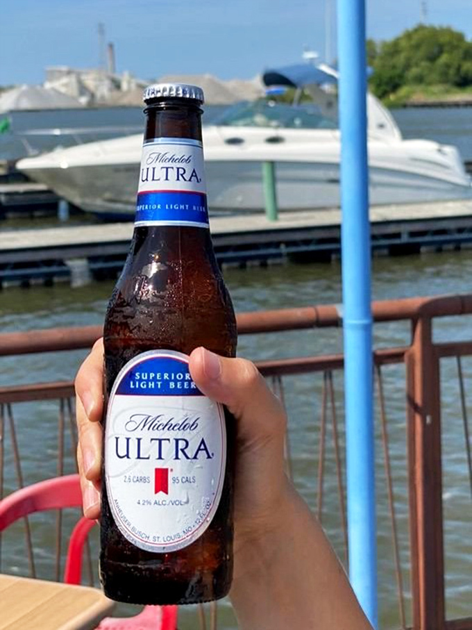 Cold beer with a water view &ndash; the perfect pairing for seafood and sunshine at Pickle Bill's riverside perch.