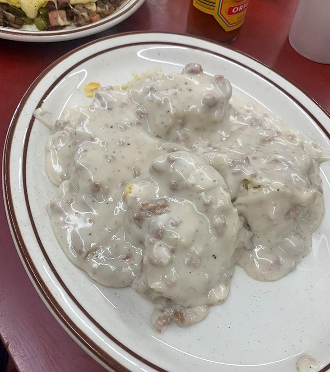 Biscuits and gravy so rich and creamy they should come with their own warning label. Cardiologists hate this dish, but your soul will thank you.