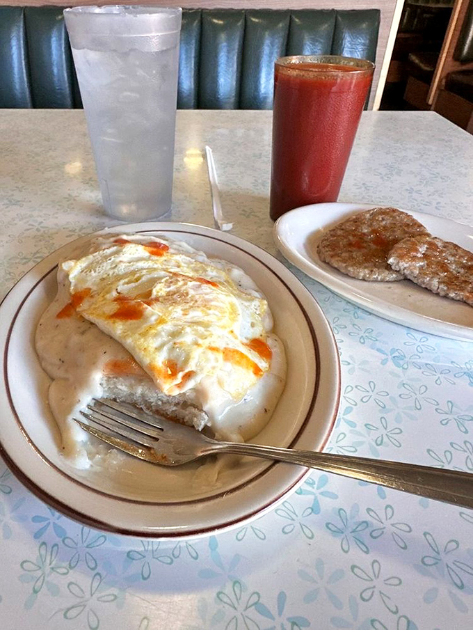 Biscuits and gravy with eggs&mdash;the breakfast that says, "Your day might be complicated, but your morning doesn't have to be."