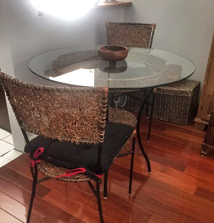 This glass-topped bistro set whispers of morning coffees and crossword puzzles. Someone's past conversations make room for your future ones.