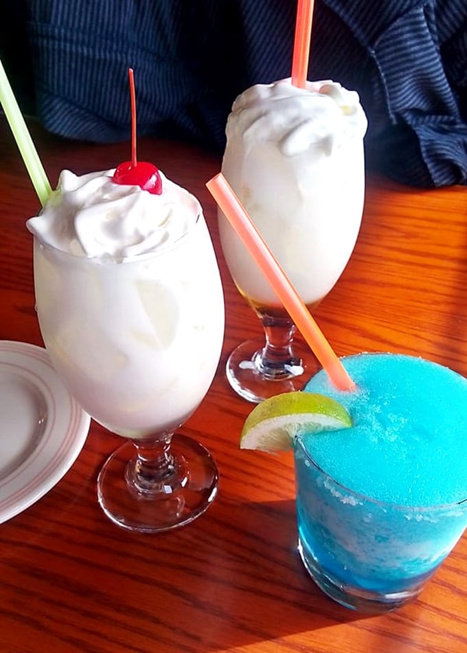 These drinks aren't just beverages&mdash;they're liquid intermissions between bites of beef. That blue margarita is practically winking at you.