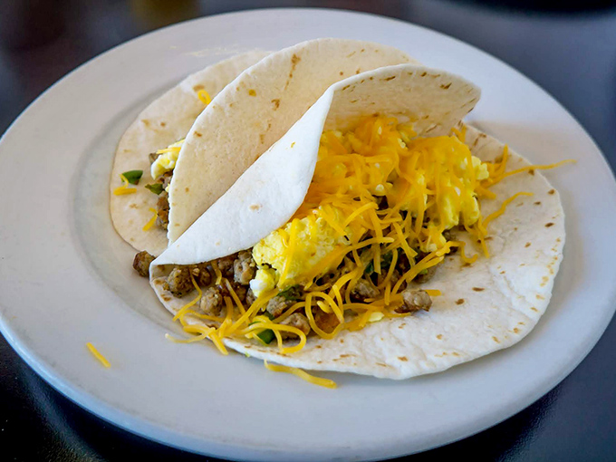 Breakfast tacos that blur the line between morning and afternoon&mdash;a tortilla treasure chest filled with eggs, meat, and melty cheese.