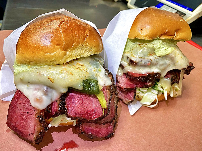 These brisket sandwiches aren't just lunch – they're edible architecture with layers of smoke, spice, and everything nice between two buns.