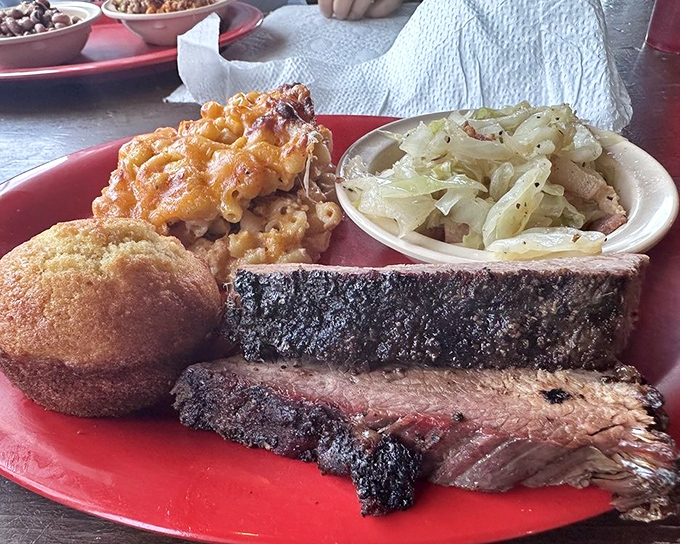 Brisket with the perfect bark, mac and cheese with the golden crust, and sides that refuse to be overshadowed&mdash;a plate of pure happiness.