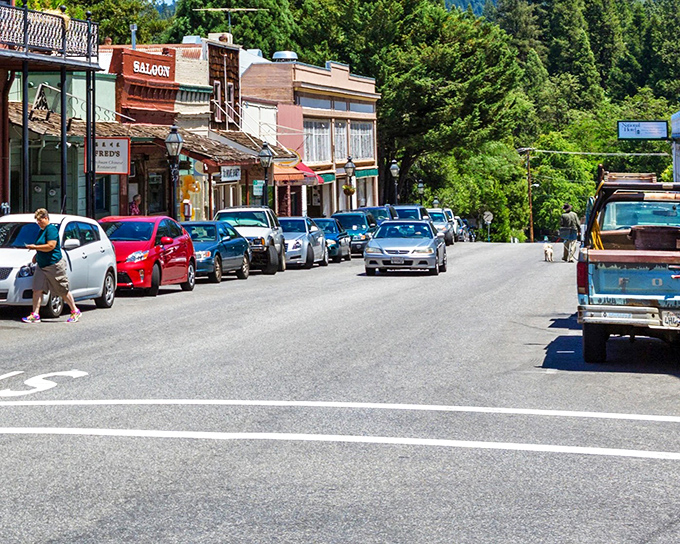 Broad Street's gentle slope creates a natural theater where daily life unfolds against a backdrop of historic architecture and Sierra sunshine.