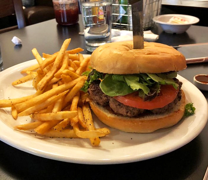 A burger that makes you question why you ordered breakfast. Those fries aren't just sides&mdash;they're golden ambassadors of potato perfection.
