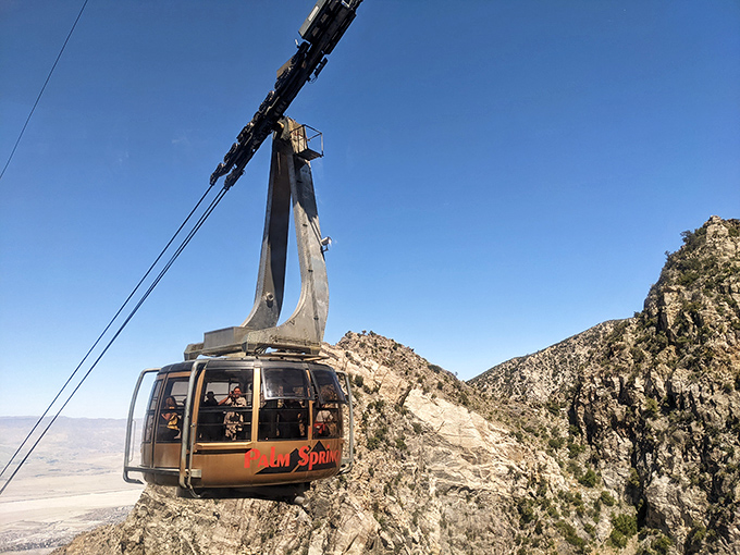The rotating tramcar: part engineering marvel, part thrill ride. Like a gondola in Venice, if Venice were suspended 8,500 feet above the desert.