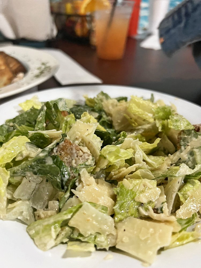 A Caesar salad that knows its role&mdash;the supporting actor that deserves its own award for balancing out a seafood feast.