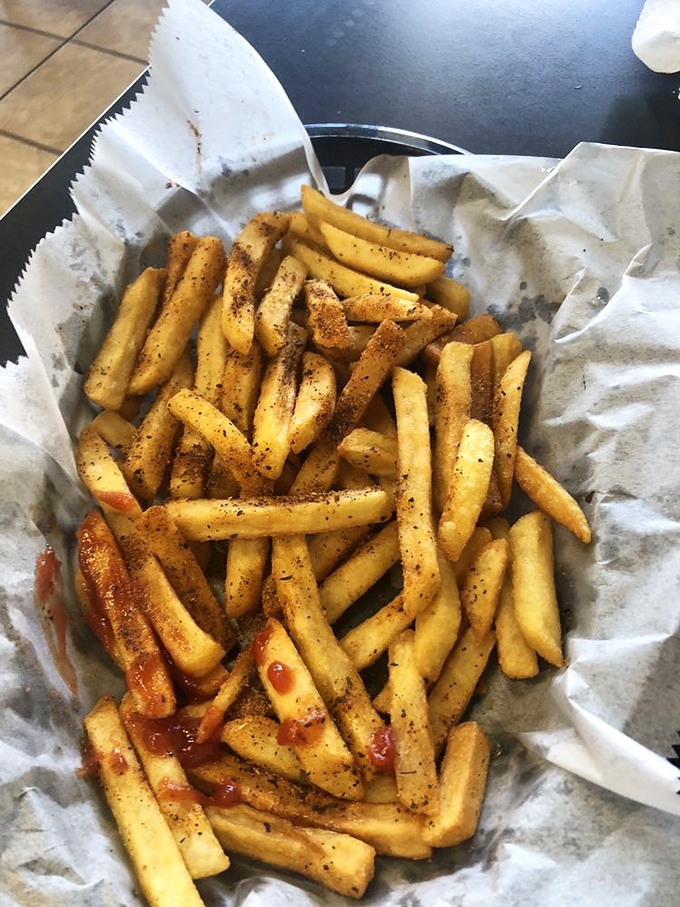 Cajun fries that bring Louisiana heat to Pennsylvania plates. Each fry is a spice-dusted wand that makes ketchup entirely optional.