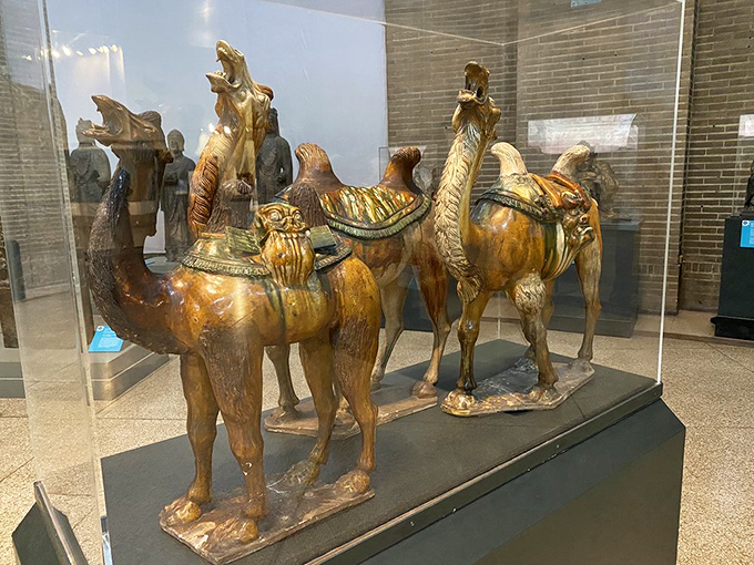 Tang dynasty camels strutting their stuff, making desert crossings look positively glamorous.