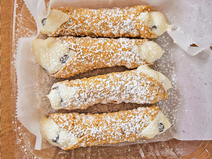 Sweet endings come in powdered packages. These cannoli aren't just dessert; they're the exclamation point at the end of a perfect meal.