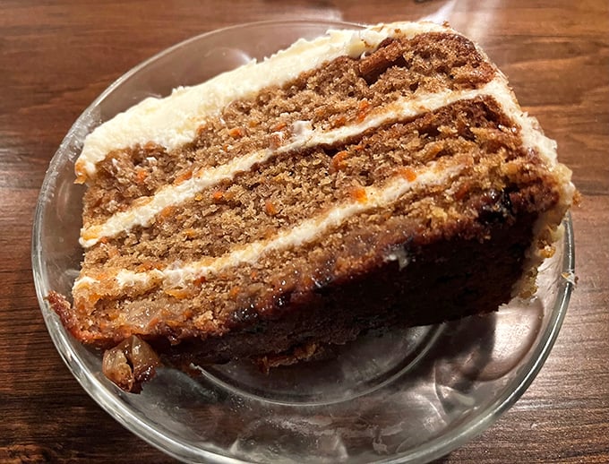 Three layers of moist carrot cake with cream cheese frosting—because after conquering prime rib, you deserve a proper dessert victory lap.