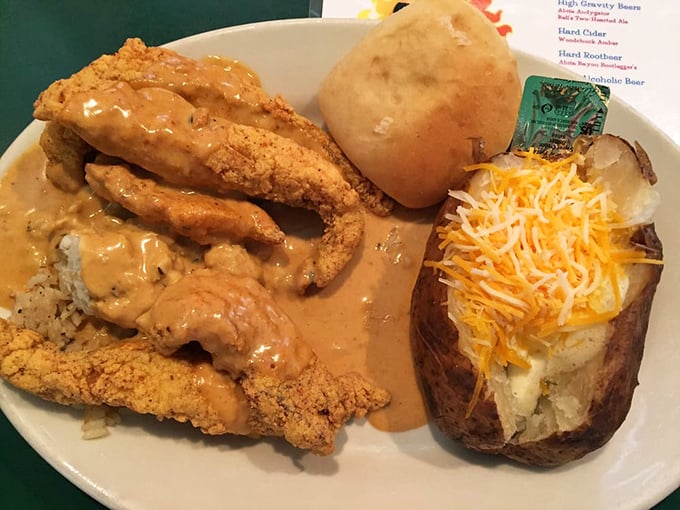 Catfish gets the royal treatment with a loaded baked potato sidekick&mdash;a plate that says "Yes, inland seafood can absolutely be this good."